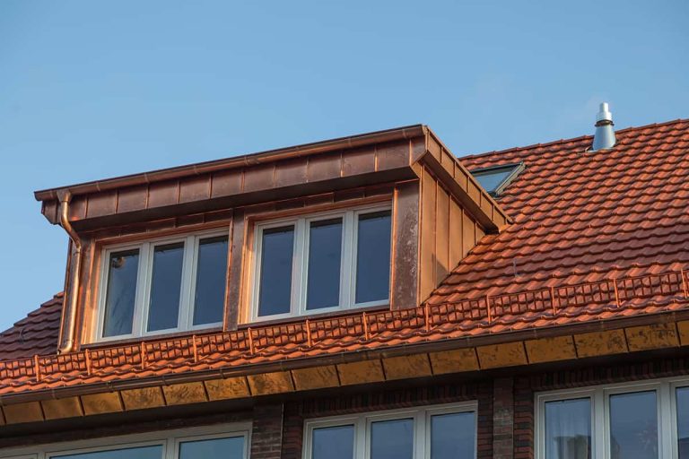 What Color Gutters for a Brick House (4 Popular Options)